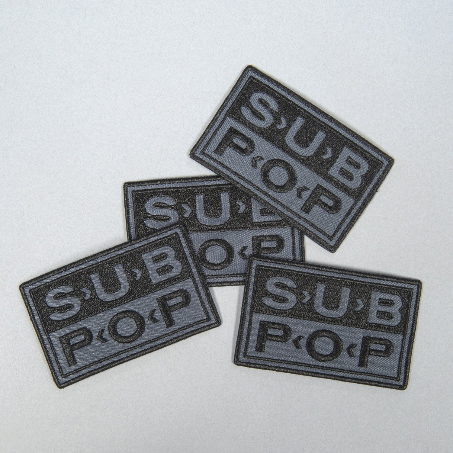 Sub Pop - Sub Pop Logo Patch Black and Grey - Sub Pop Official Store ...